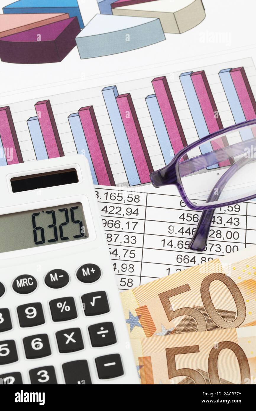 Calculators and Key Figures Stock Photo - Alamy