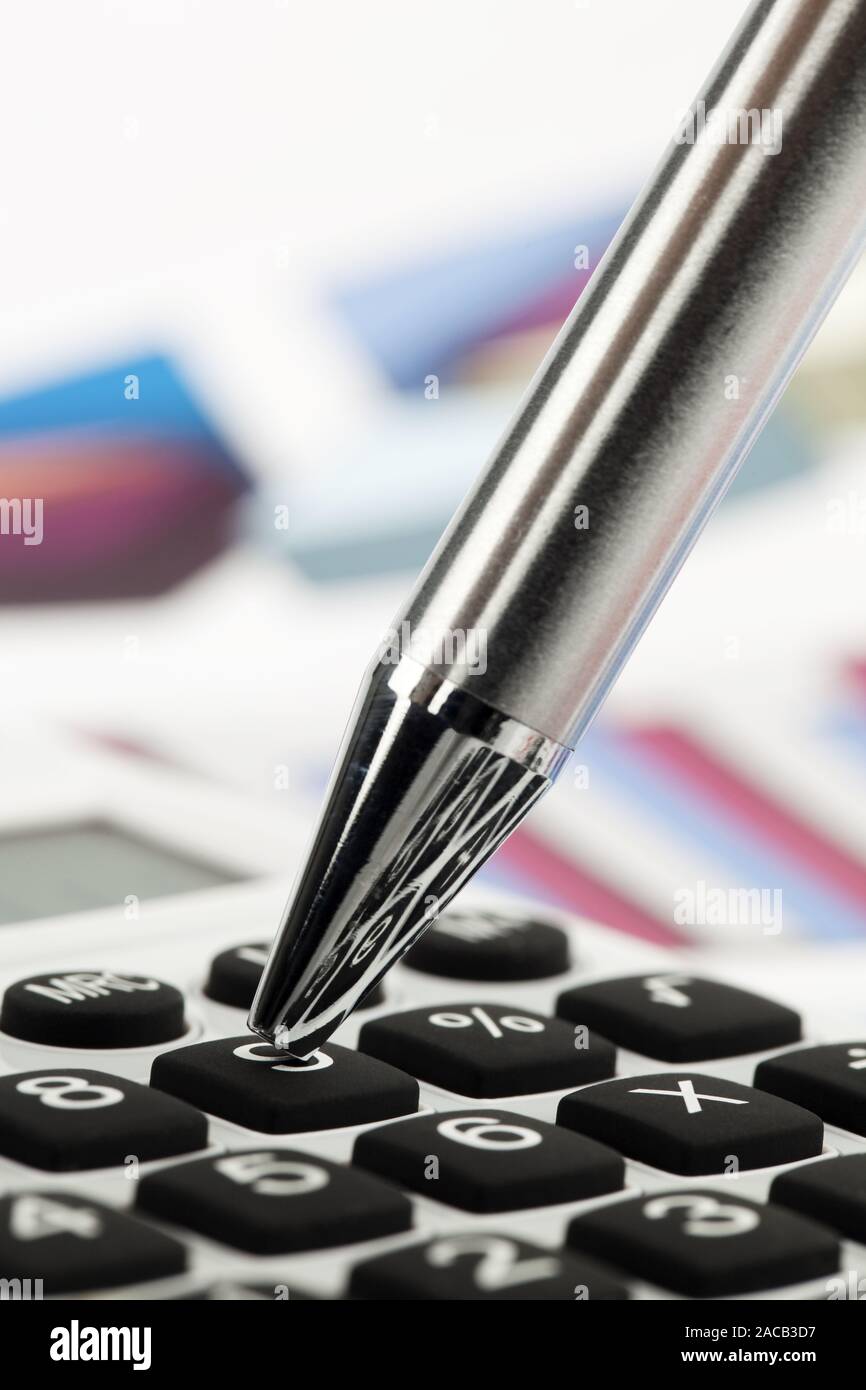 Calculators and Key Figures Stock Photo - Alamy