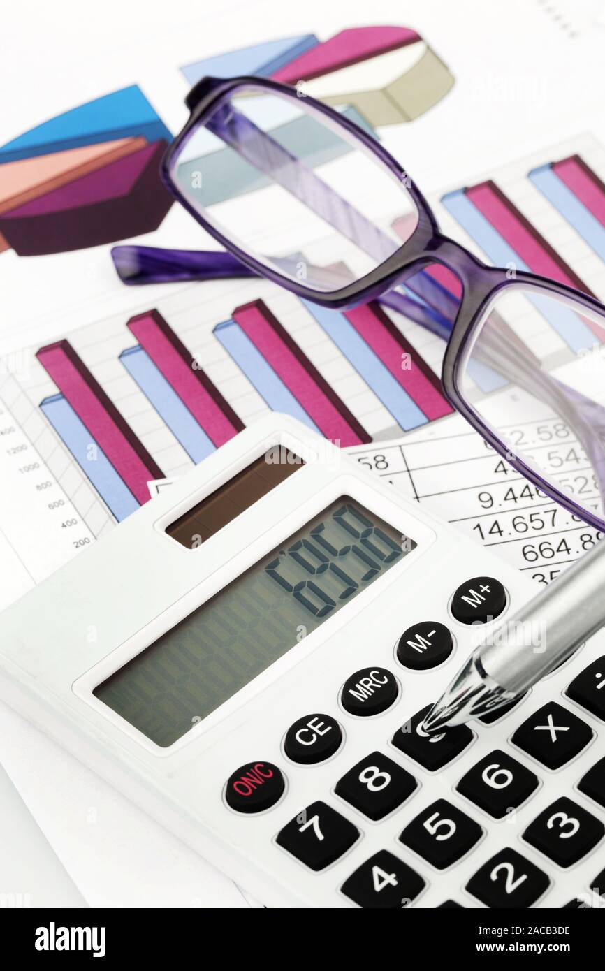 Calculators and Key Figures Stock Photo - Alamy