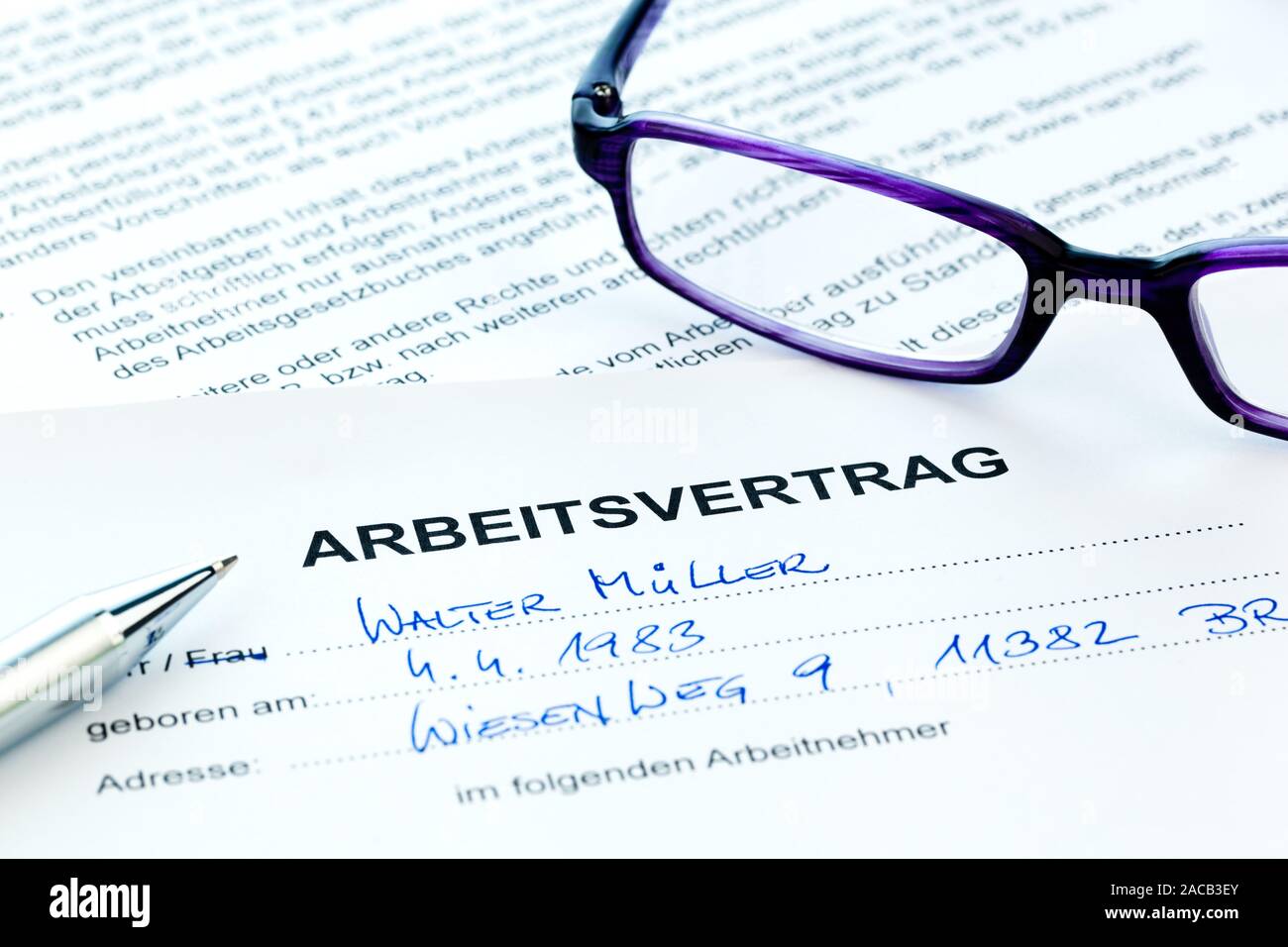 Employment contract in German language Stock Photo - Alamy