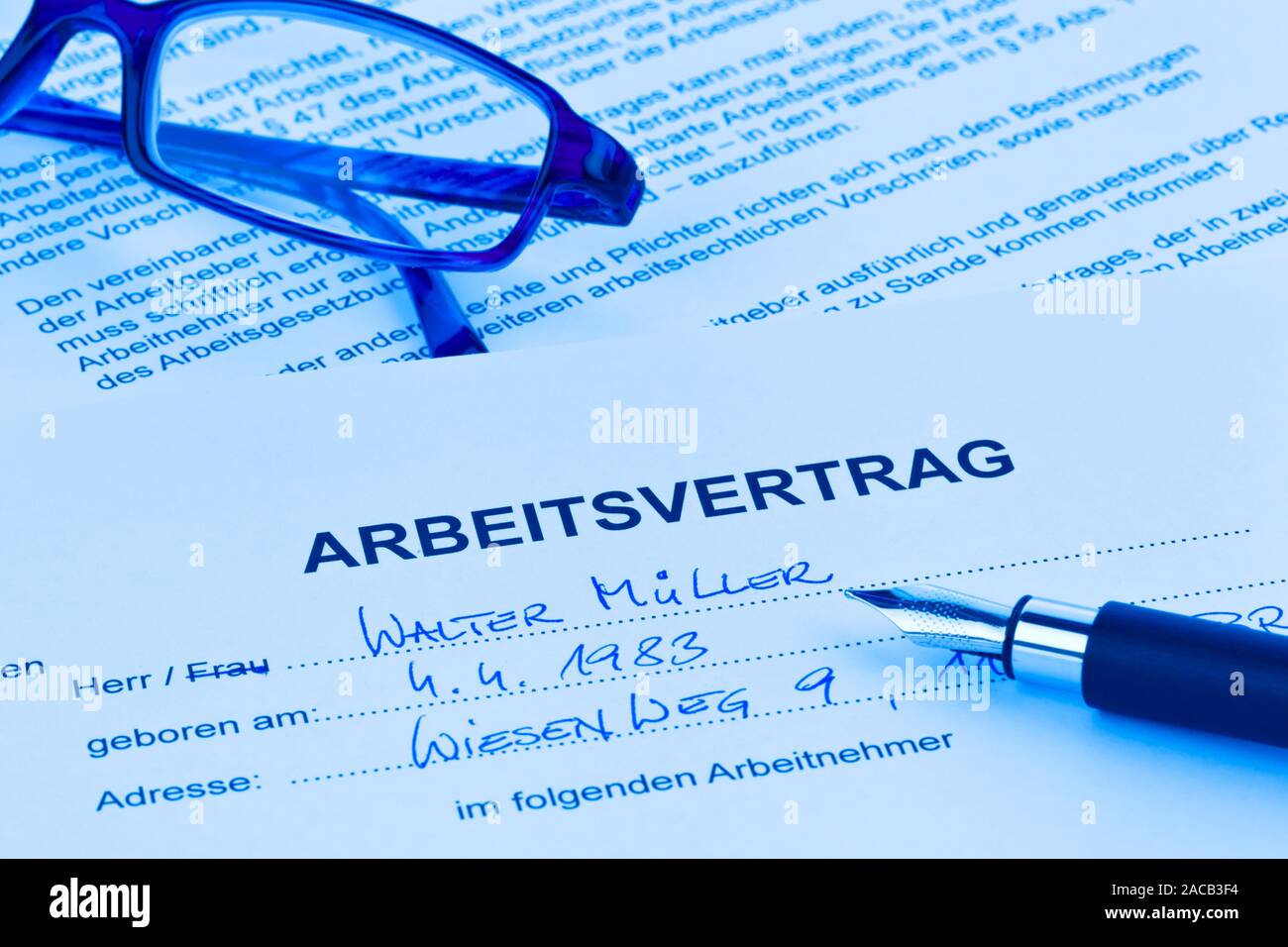 Employment contract in German language Stock Photo - Alamy