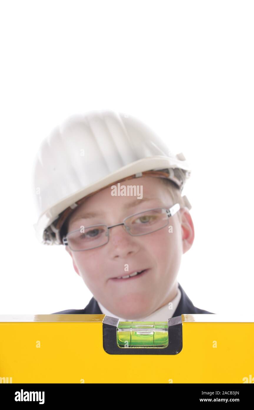 Small architect with spirit level Stock Photo - Alamy