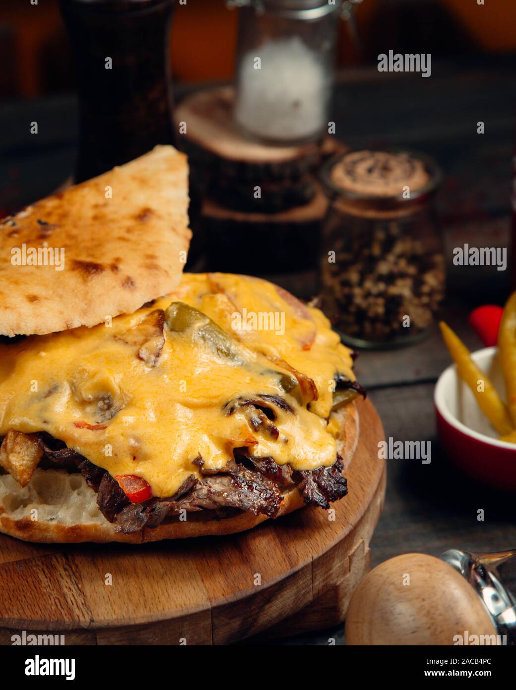 doner in a round tenir of meat, potatoes and cream cheese Stock Photo ...