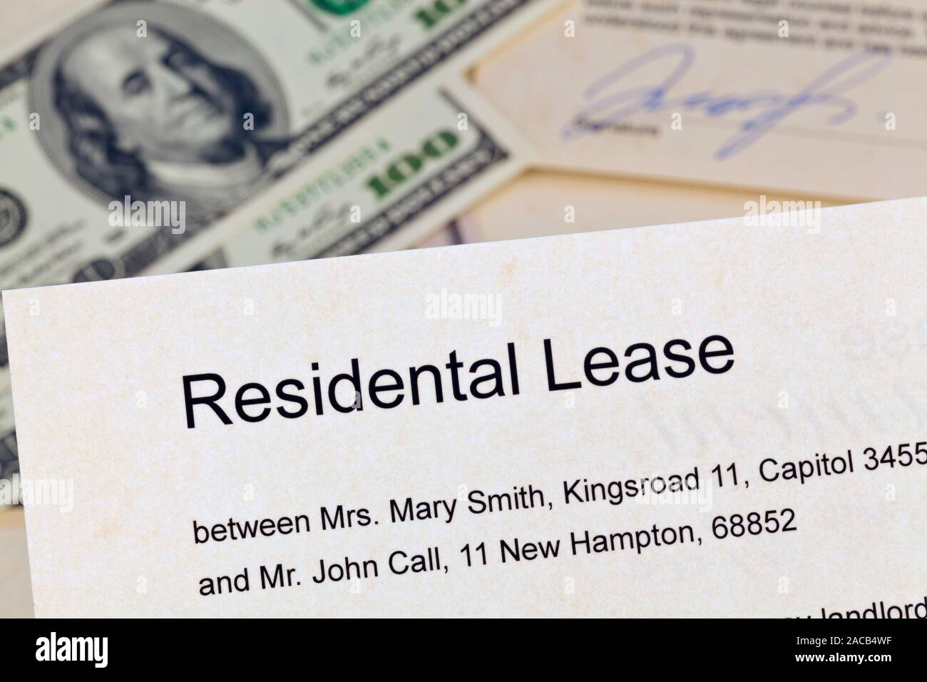 Key to apartment and tenancy agreement Stock Photo - Alamy