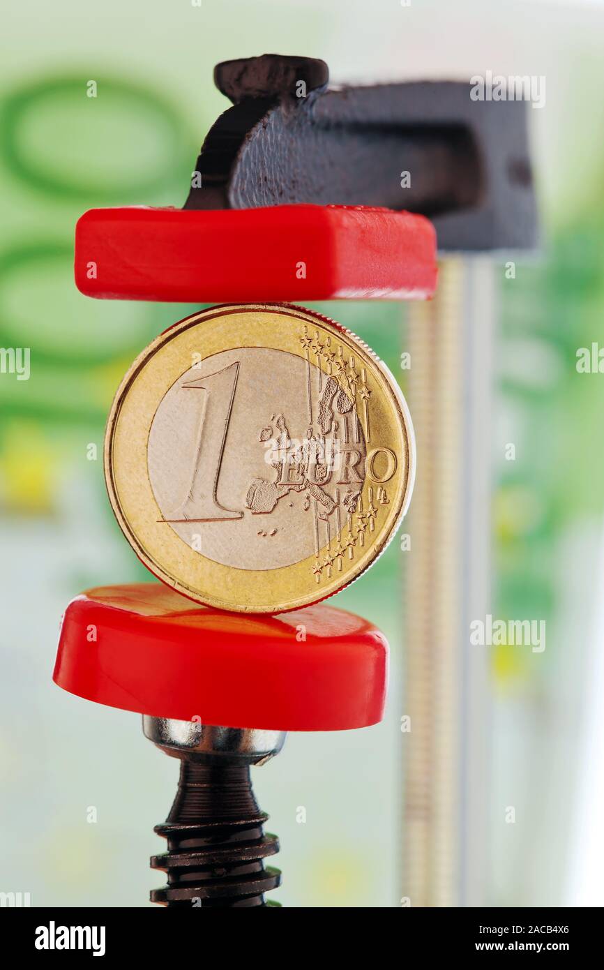 Euro coin in vice hi-res stock photography and images - Alamy