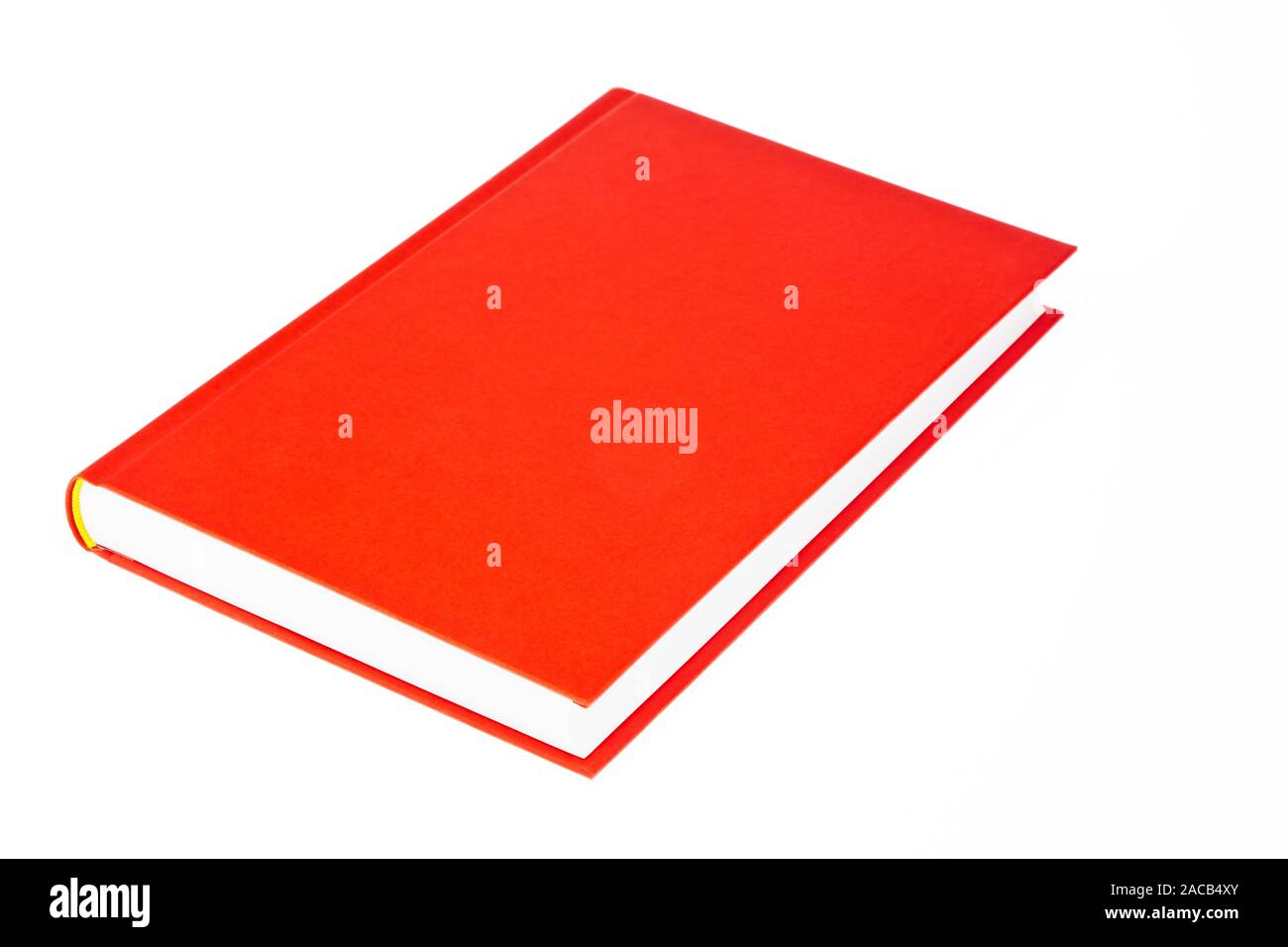 Red book on white background Stock Photo - Alamy