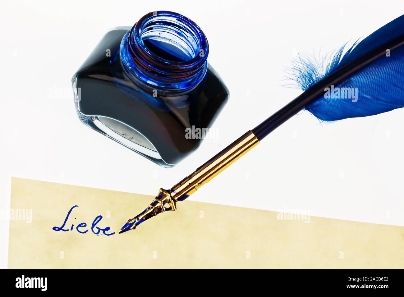 Blue quill feather Stock Photo - Alamy