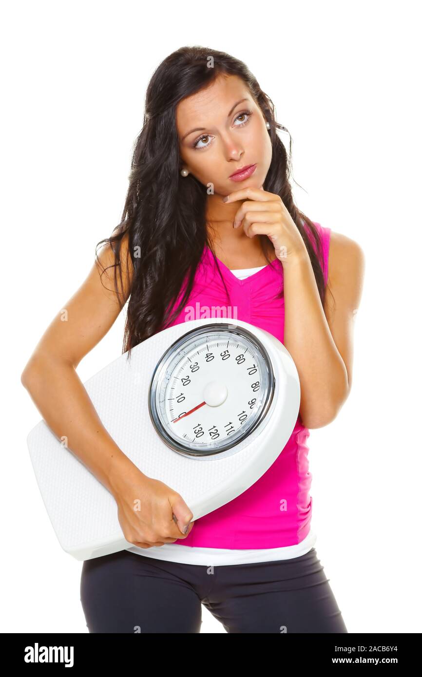 Woman is dissatisfied with body weight Stock Photo - Alamy