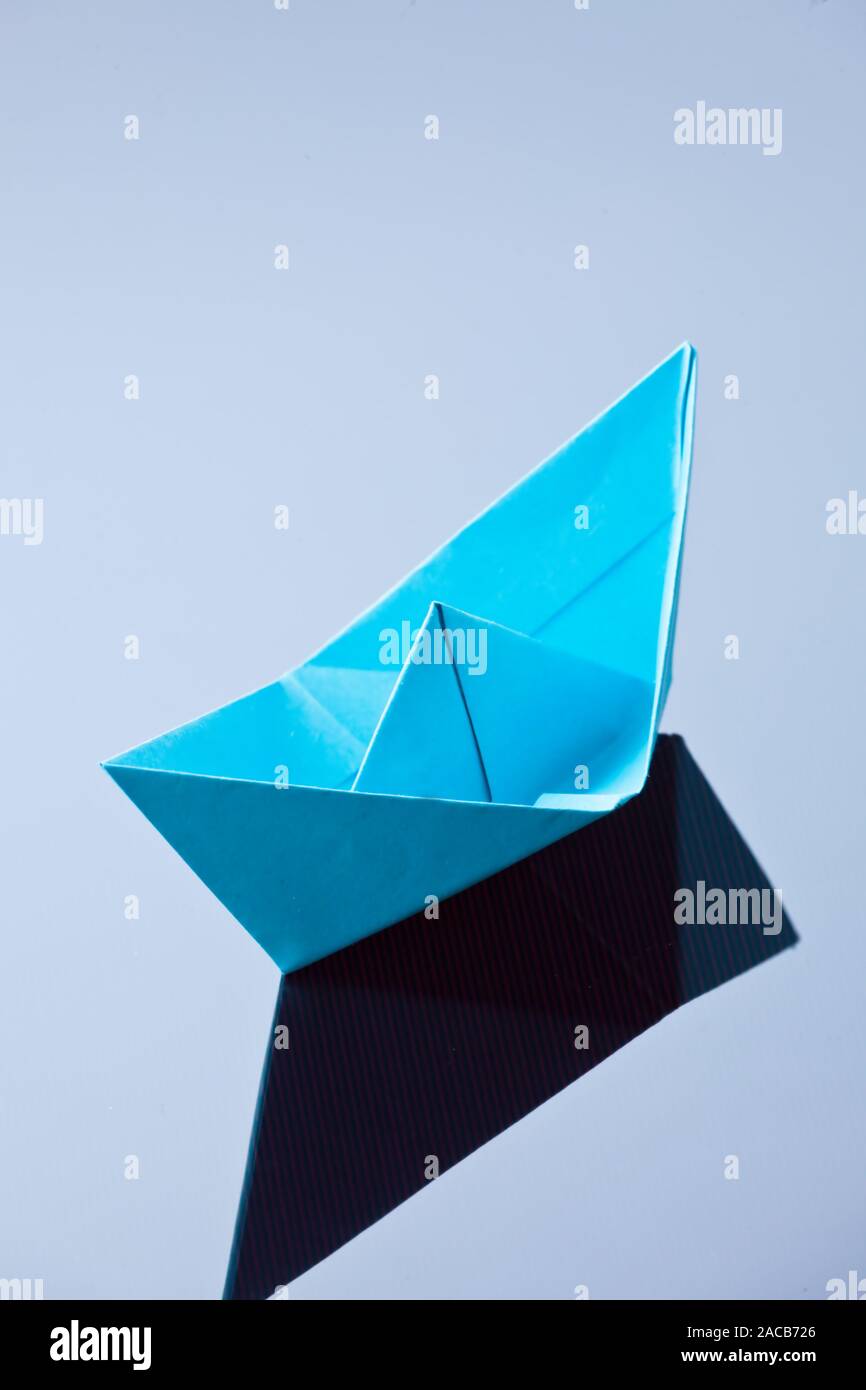 Paper ship folded Stock Photo - Alamy