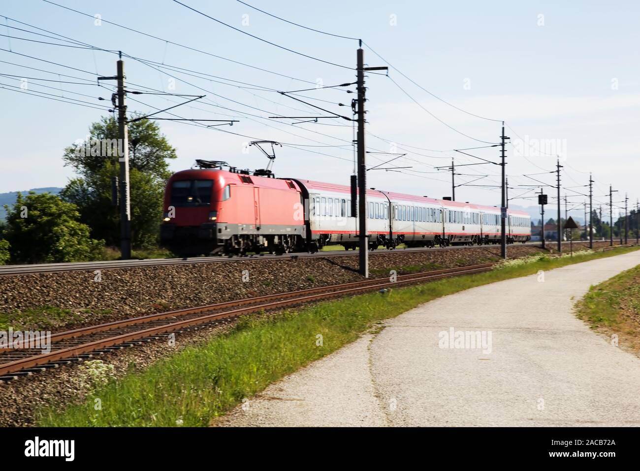 Train on railway tracks Stock Photo - Alamy