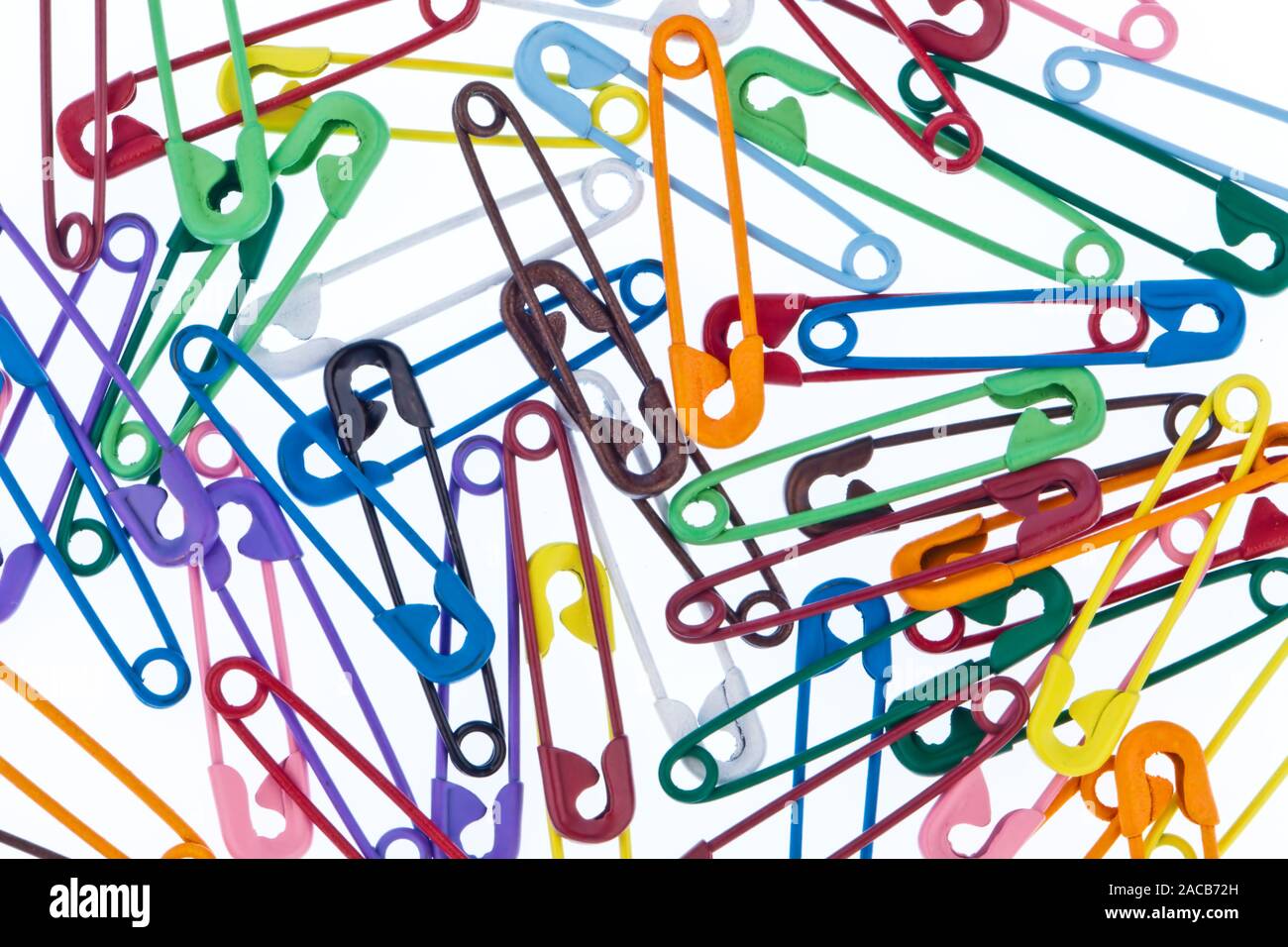 many coloured safety pins Stock Photo - Alamy