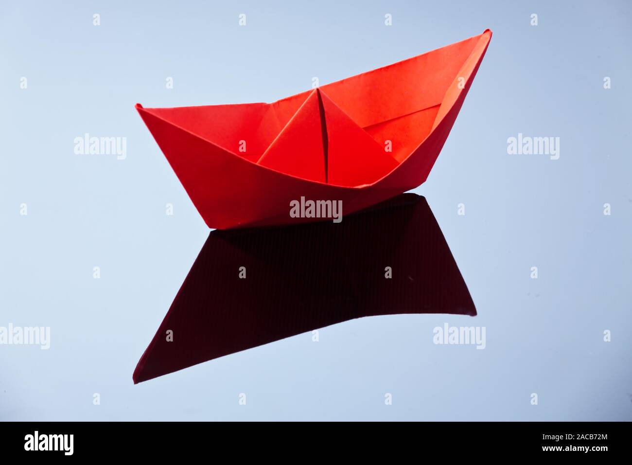 Paper ship folded Stock Photo - Alamy