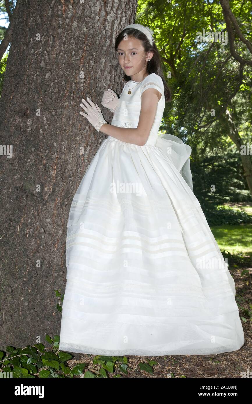 Girl with communion dress hi-res stock photography and images - Alamy