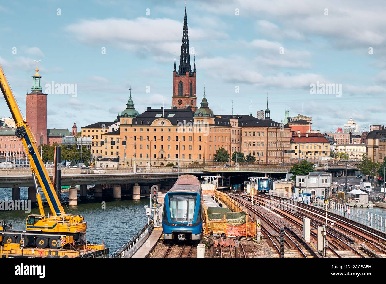 The Landscape of Stockholm city with railway and a train at the ...