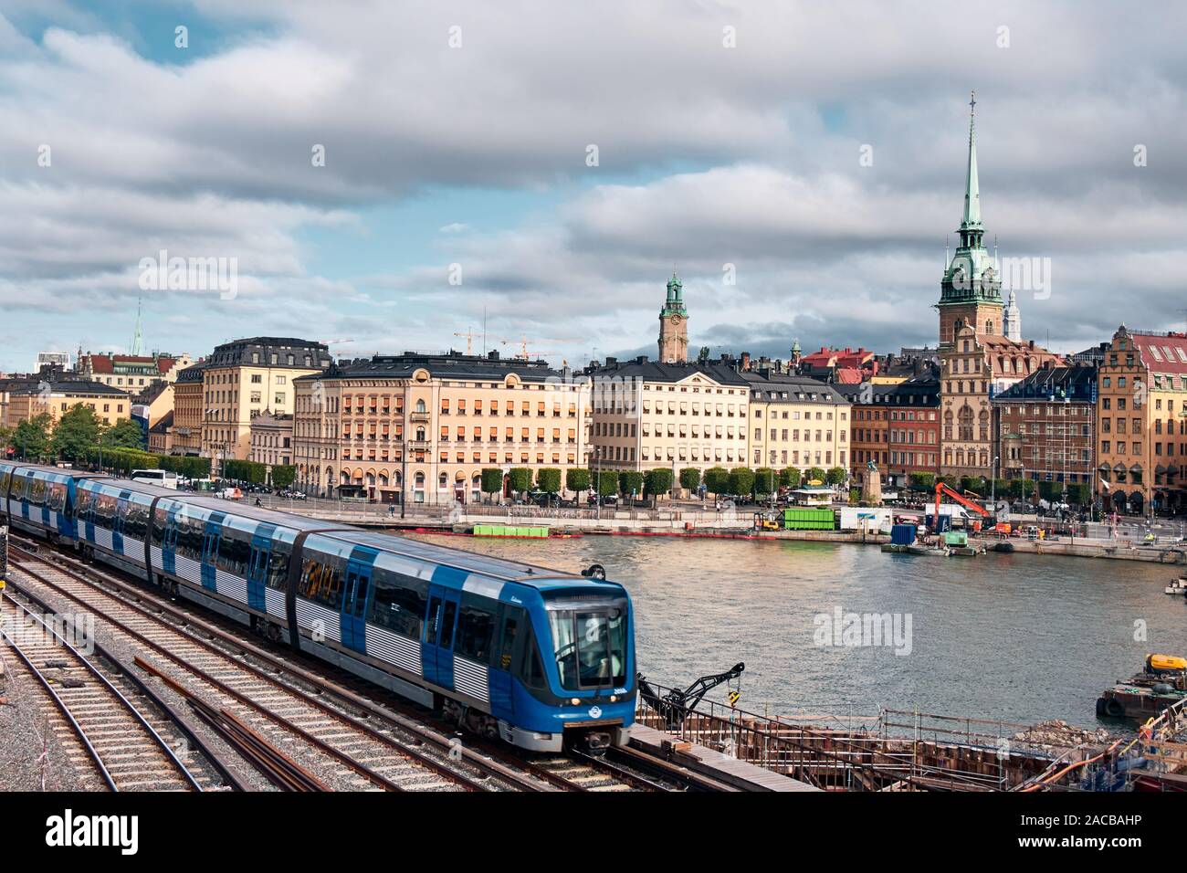 The Landscape of Stockholm city with railway and a train at the ...
