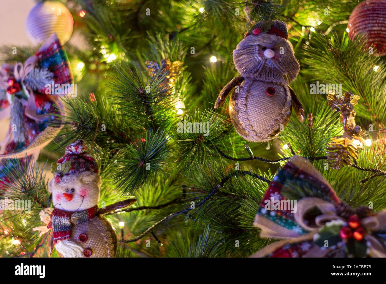 Decorated Christmas tree and creche on a blurred background, and you ...