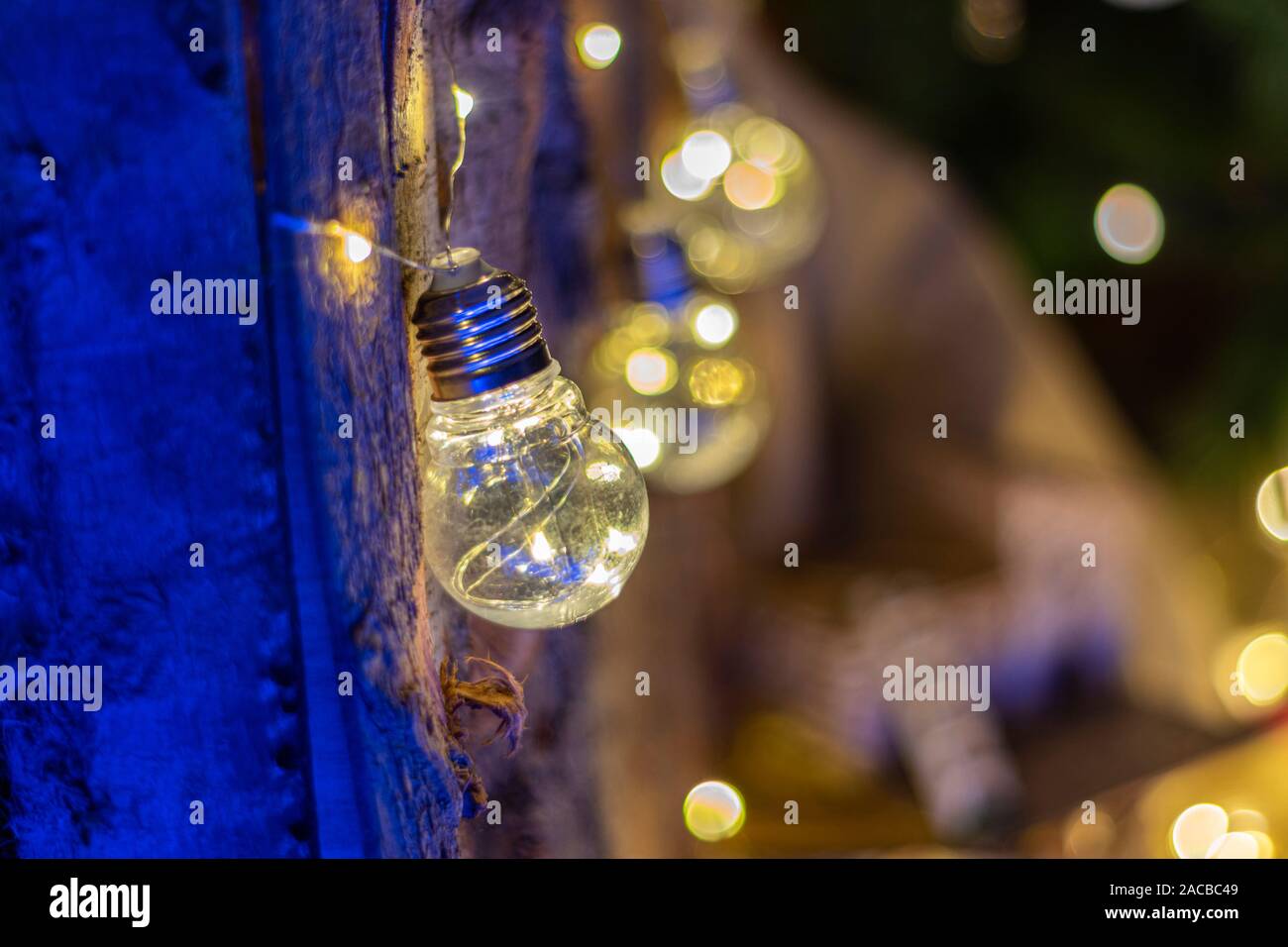 Decorated Christmas tree and creche on a blurred background, and you ...