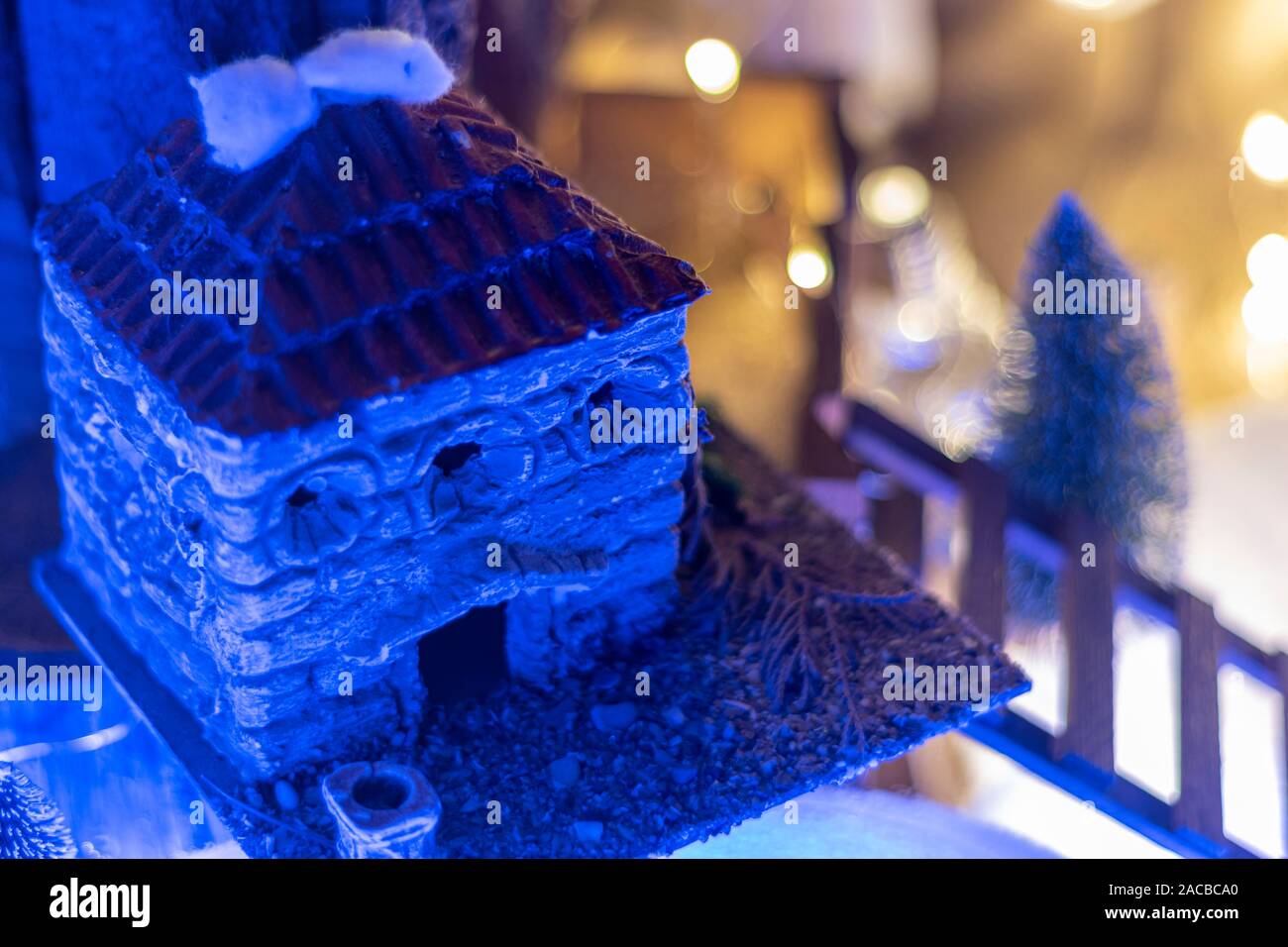 Decorated Christmas tree and creche on a blurred background, and you ...