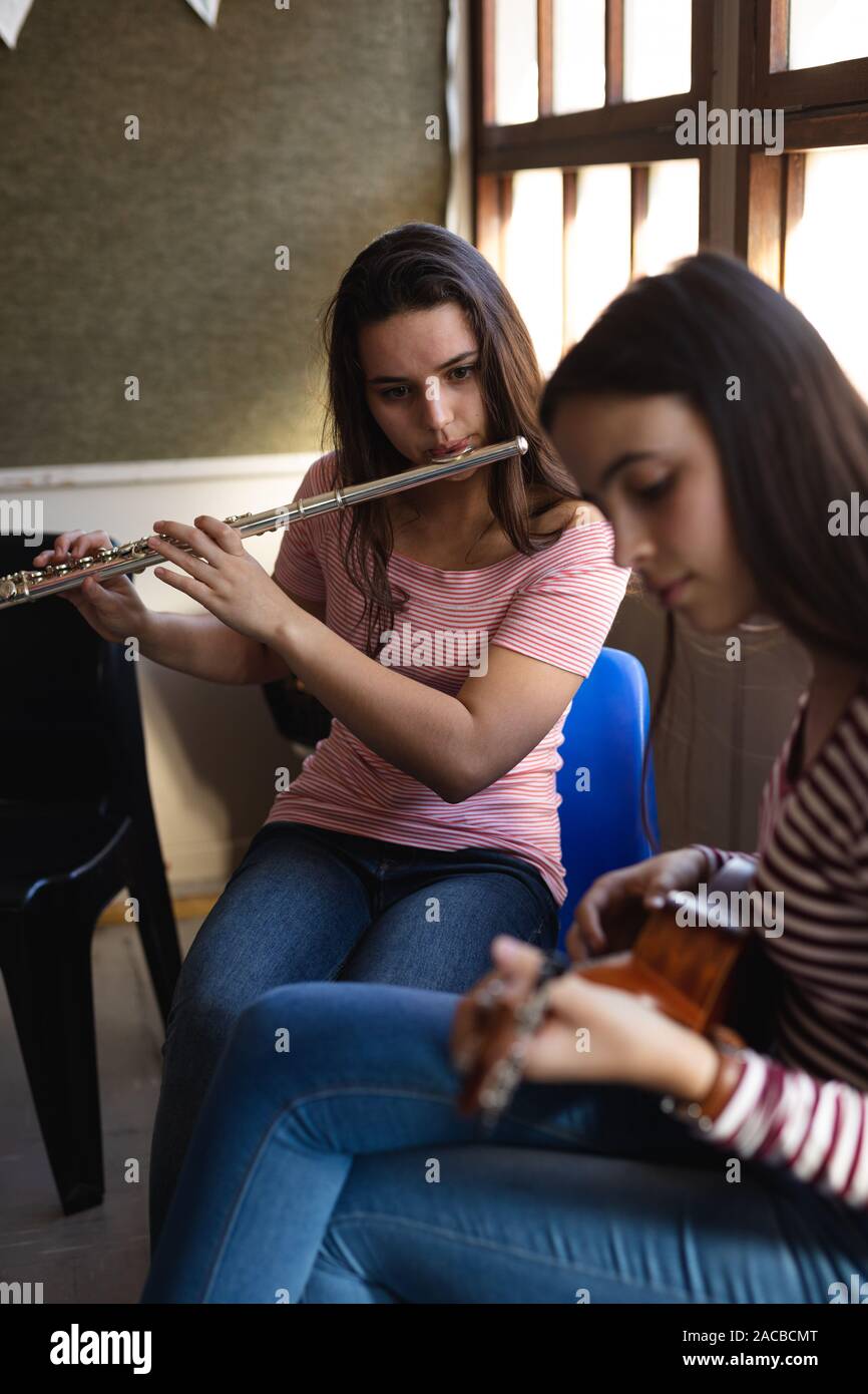 Teenage musicians rehearsing Stock Photo - Alamy
