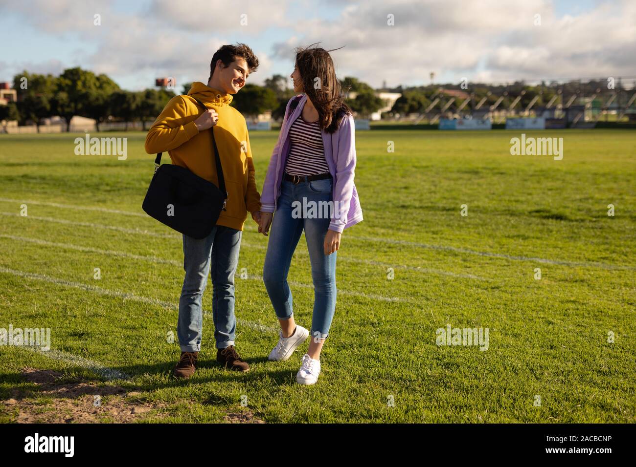 Teenagers hanging out in their school grounds Stock Photo - Alamy
