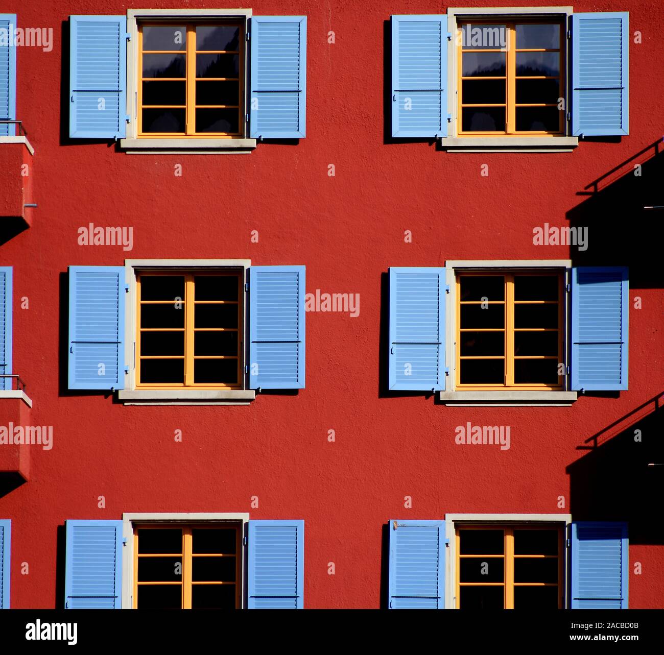 facade detail with colorful windows Stock Photo - Alamy