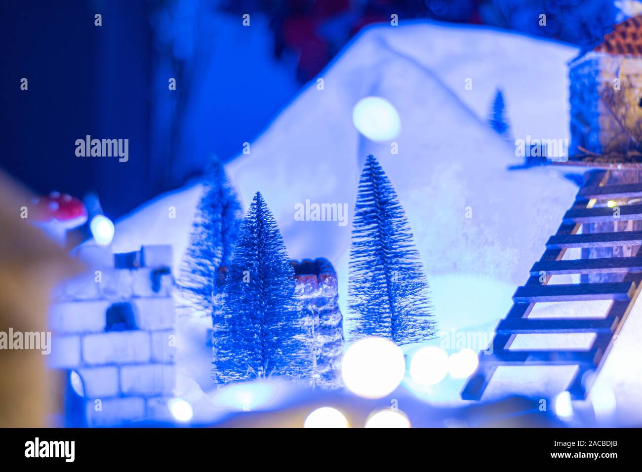 Decorated Christmas tree and creche on a blurred background, and you ...