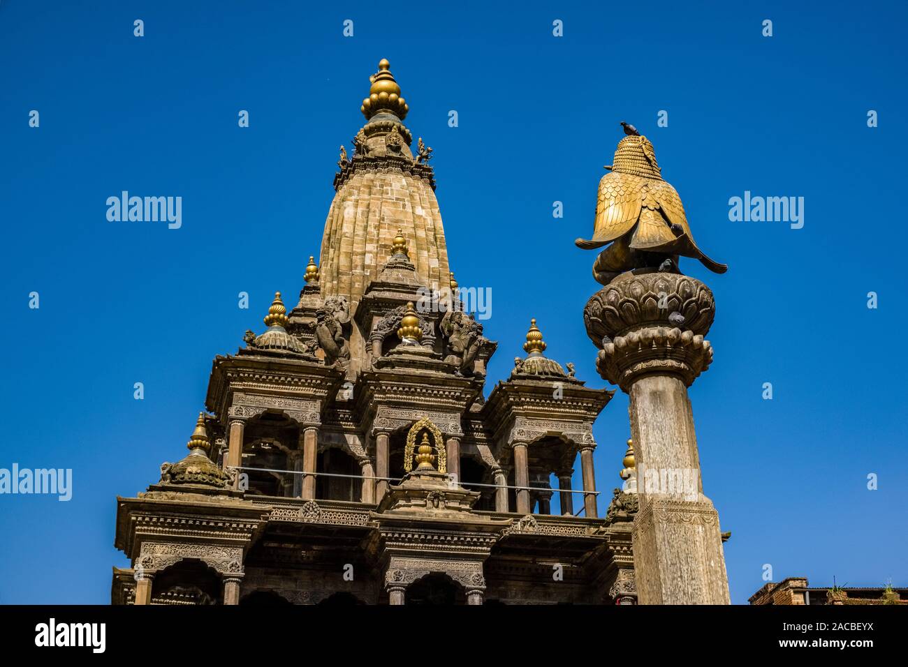 Details of temples and the golden Garuda statue on Patan Durbar Square ...