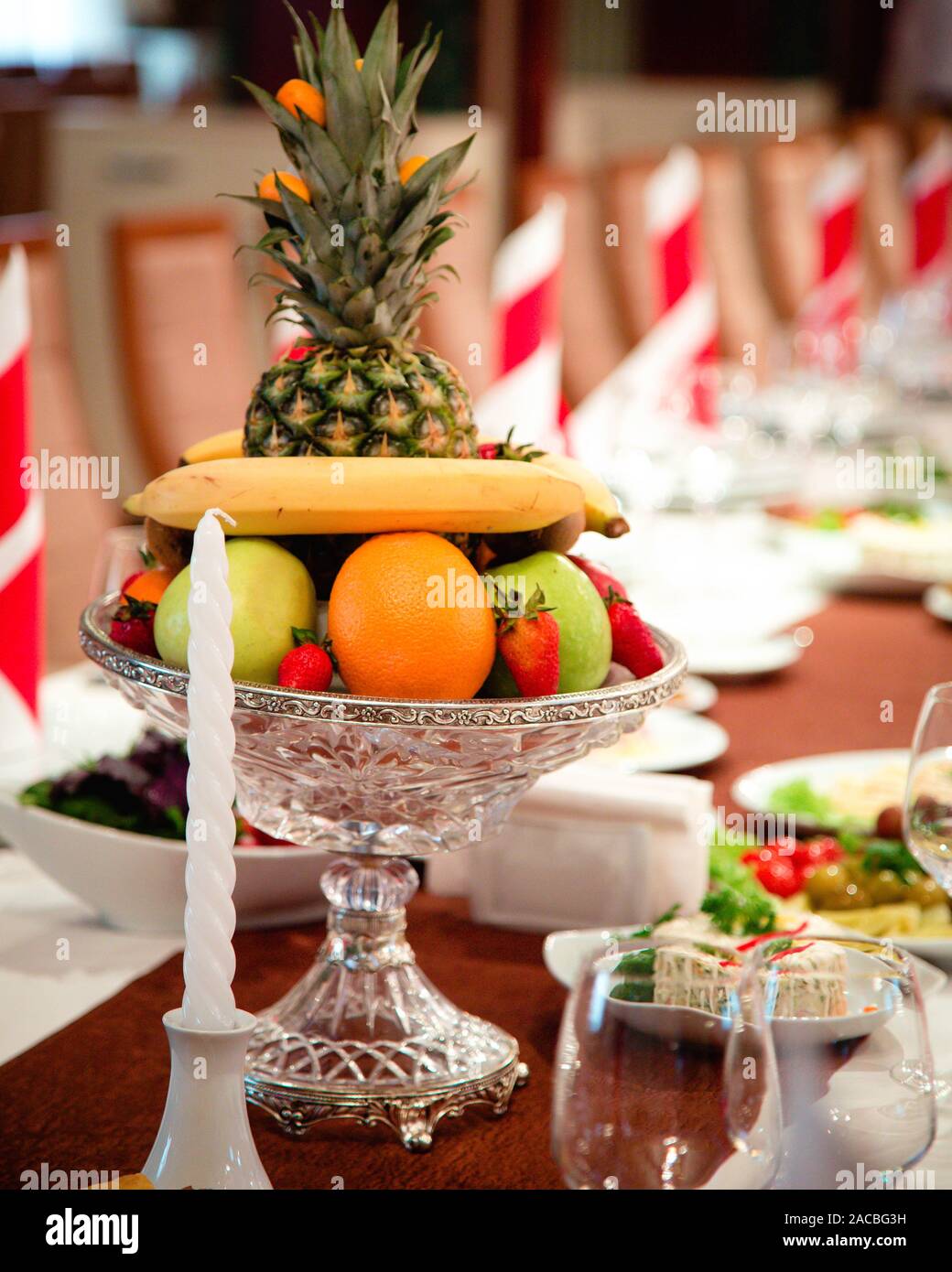 multiple fruits in the glass vase Stock Photo - Alamy