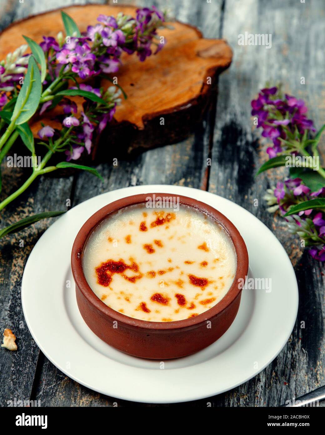 sutlach rice pudding served in pottery pan Stock Photo - Alamy