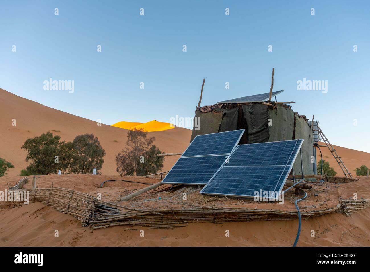 Solar energy panel in the oasis at desert. Sun as energy resource ...