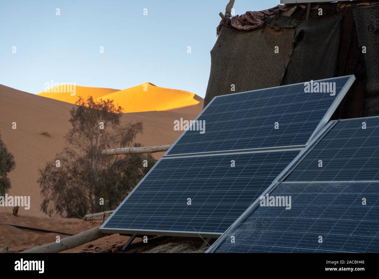 Solar energy panel in the oasis at desert. Sun as energy resource ...