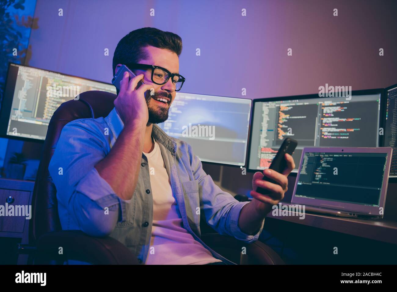 Photo of it specialist guy working late at night sitting chair many ...