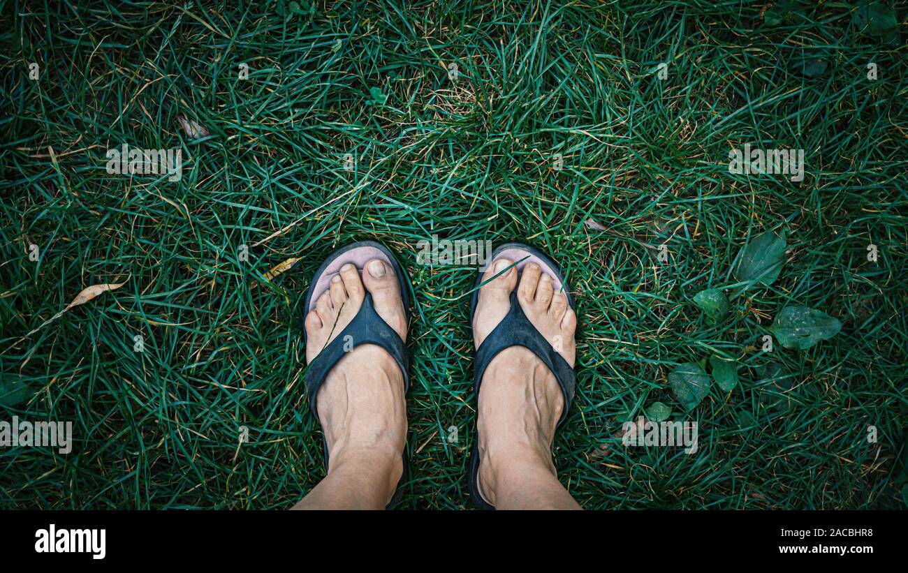 woman traveler, grass background, bare feet, Horror, vintage. Thriller ...
