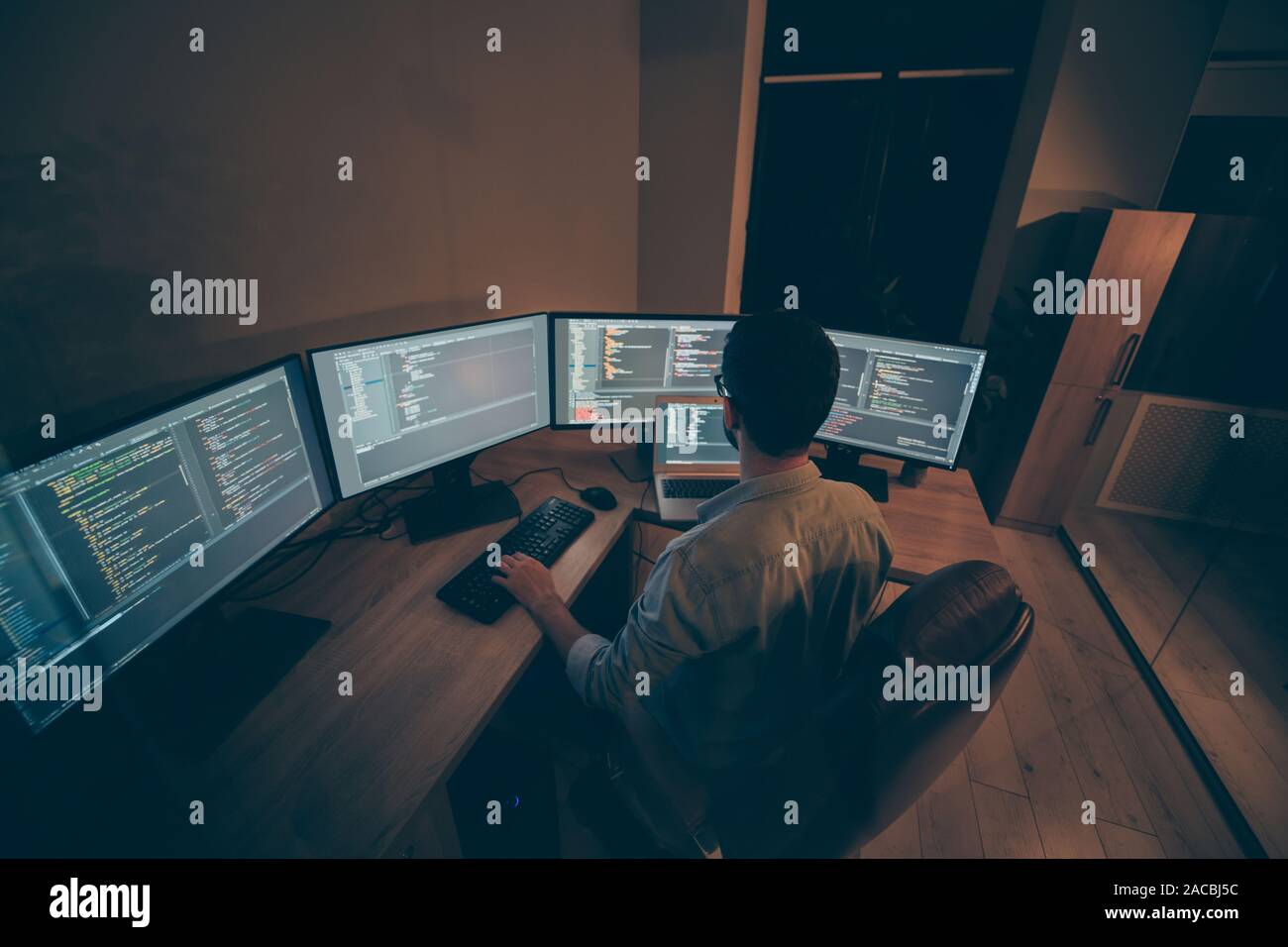 Man surrounded by screens hi-res stock photography and images - Alamy