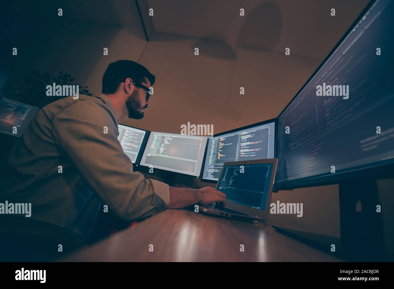 Low below angle view photo of system administrator pondering over how ...