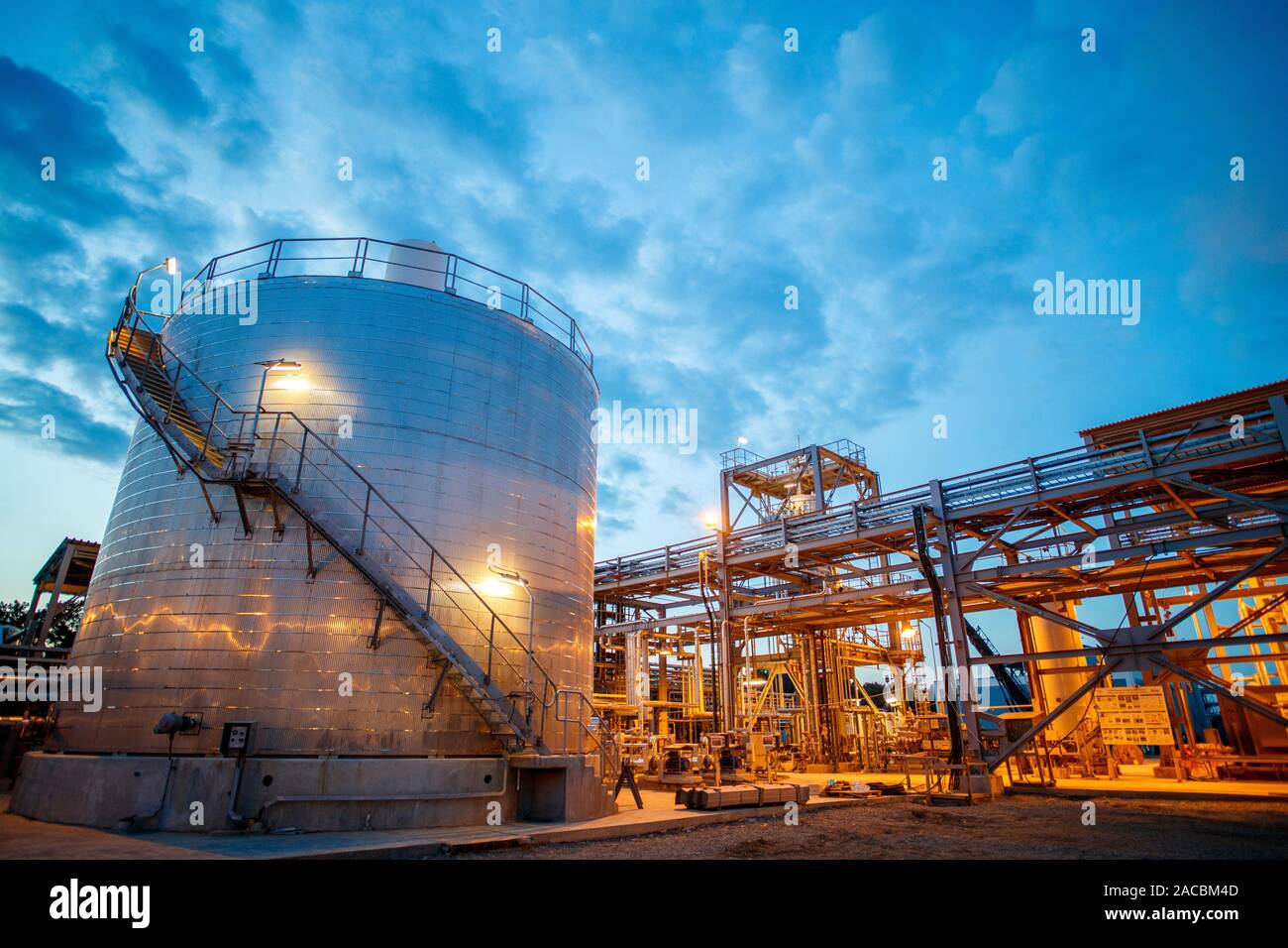 oil and gas processing tank and pipes Stock Photo - Alamy