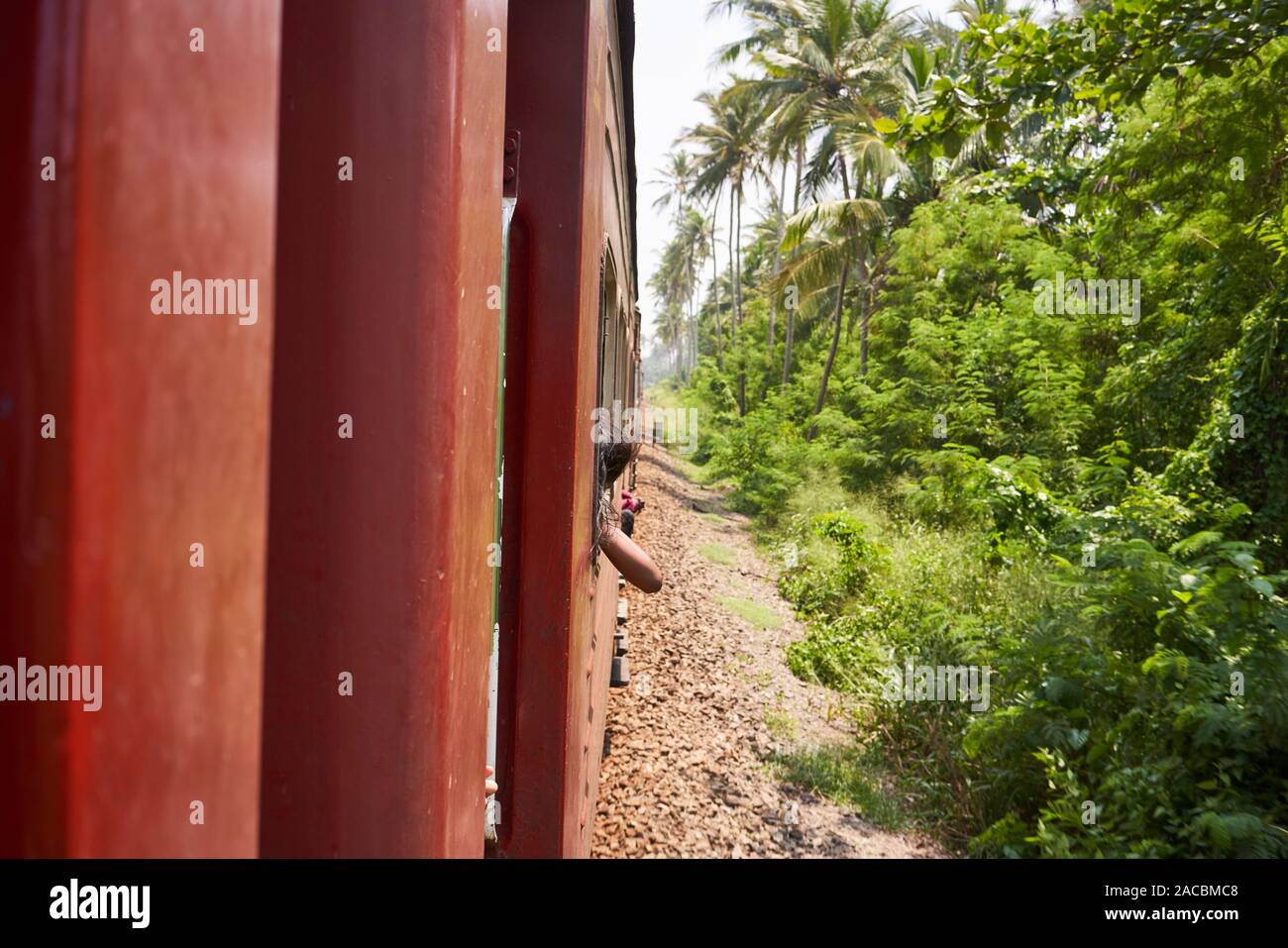 A train journey between Mount Lavinia and Galle In Sri Lanka Stock ...