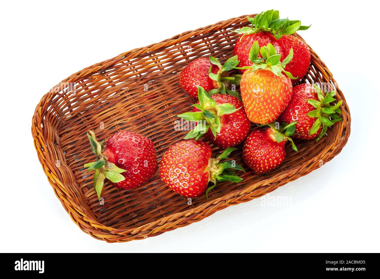 Strawberries in a basket isolated on white background Stock Photo - Alamy