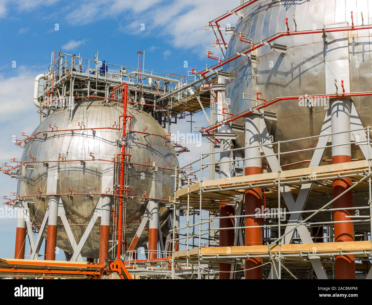 oil and gas processing large diameter round towers Stock Photo - Alamy