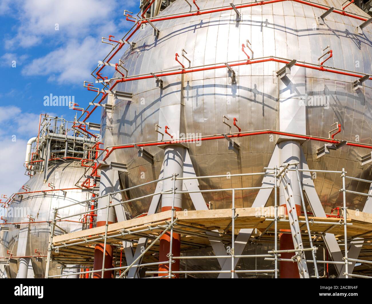 oil and gas processing large diameter round towers Stock Photo - Alamy