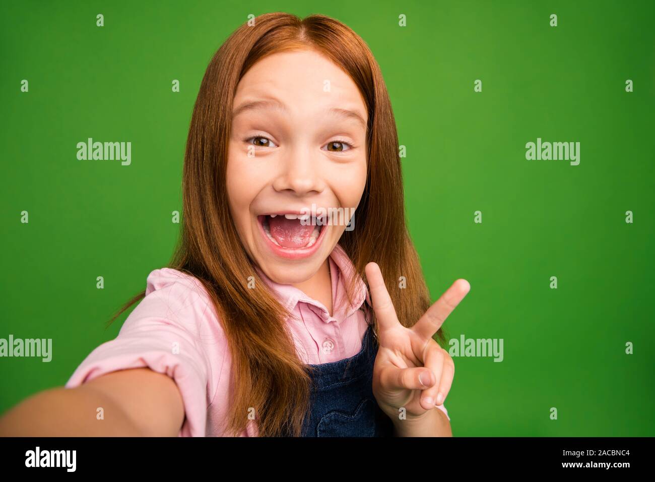Closeup photo of pretty little foxy lady showing v-sign symbol making ...