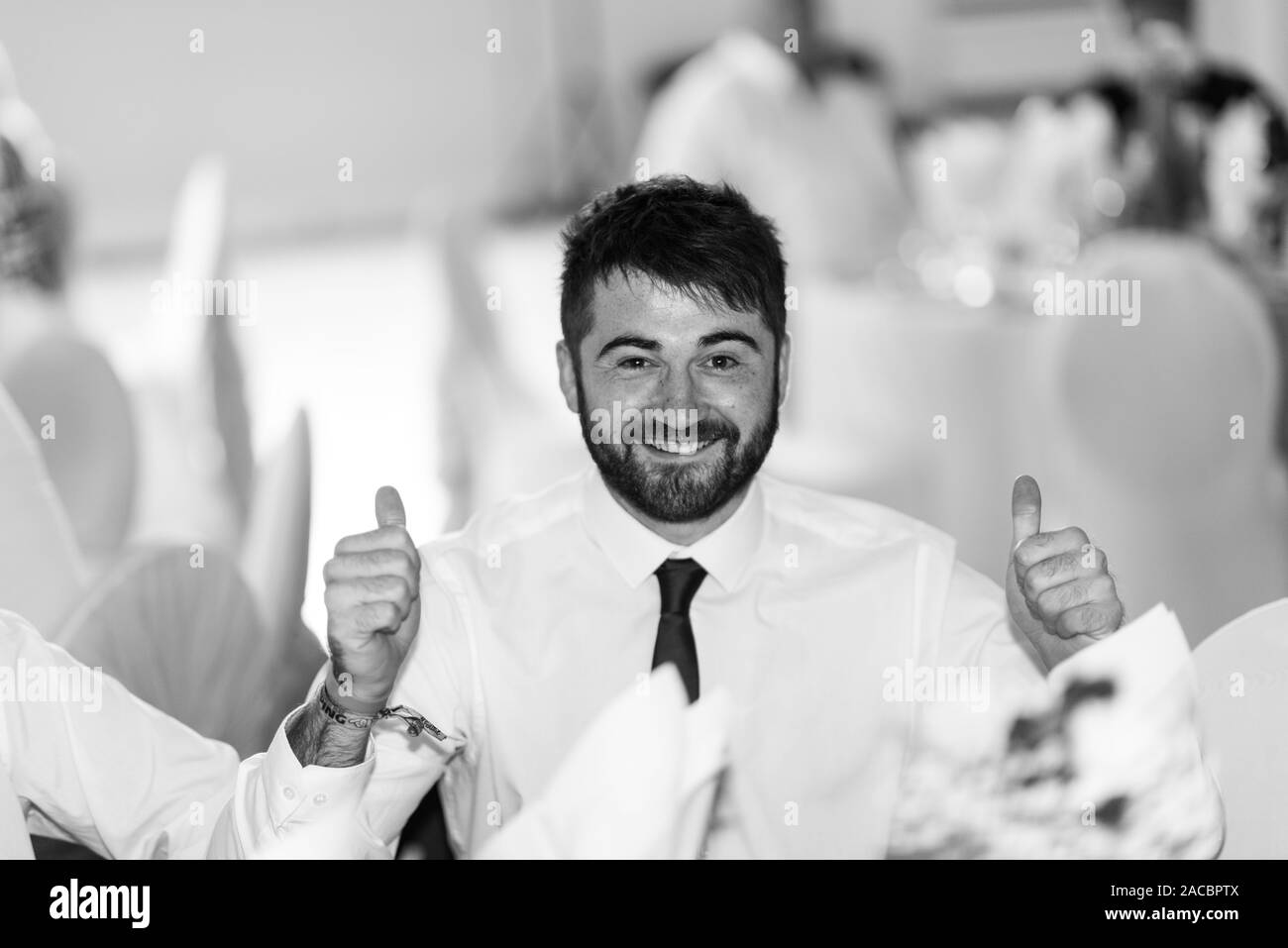 Happy, smiling wedding guests at the after ceremony, wedding breakfast ...