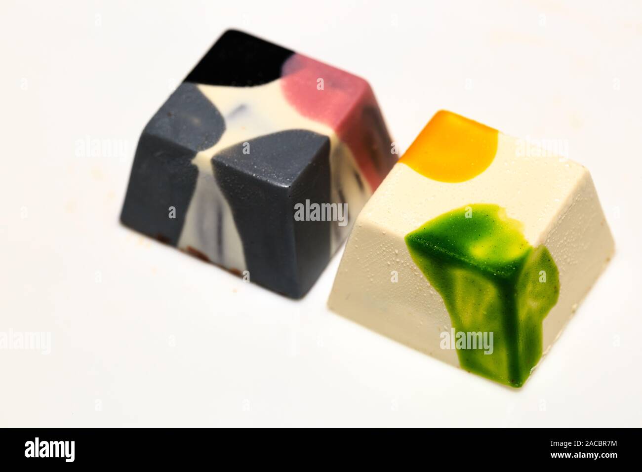 beautiful chocolate cubes placed on white background Stock Photo - Alamy
