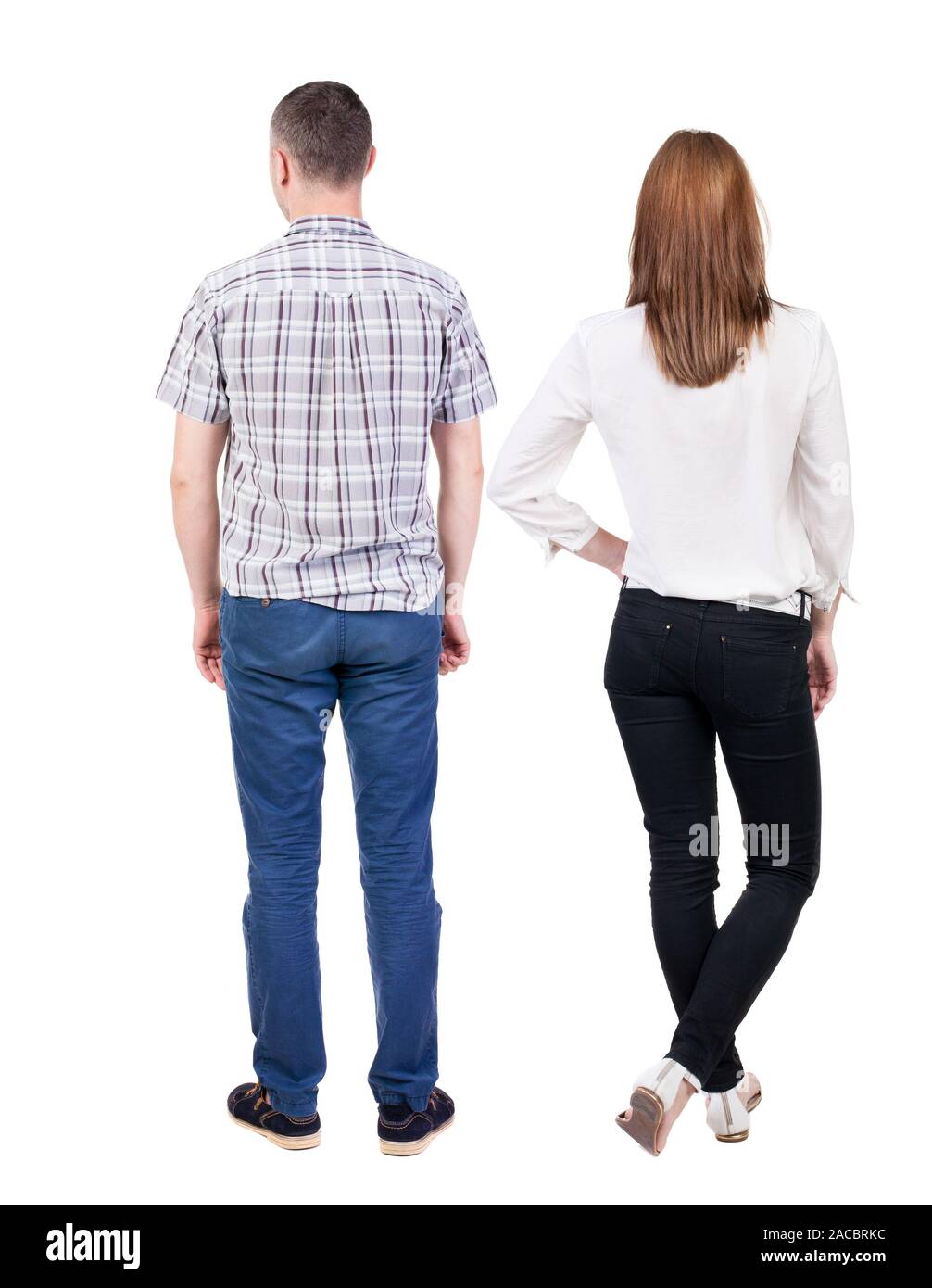 Back view of couple. beautiful friendly girl and guy together. Rear ...