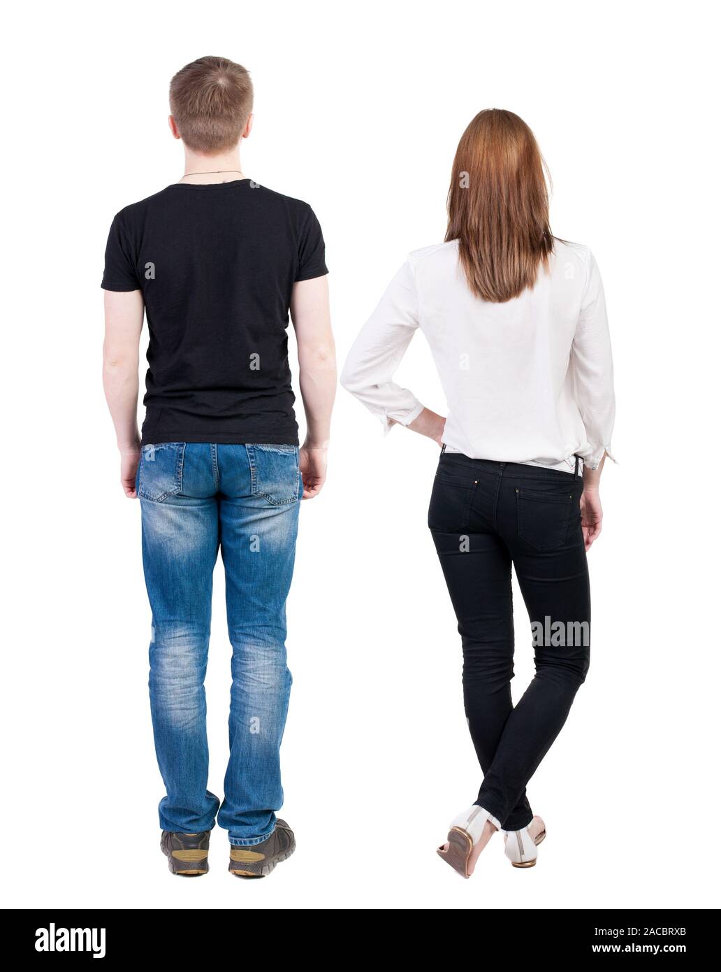 Back view of couple. beautiful friendly girl and guy together. Rear ...