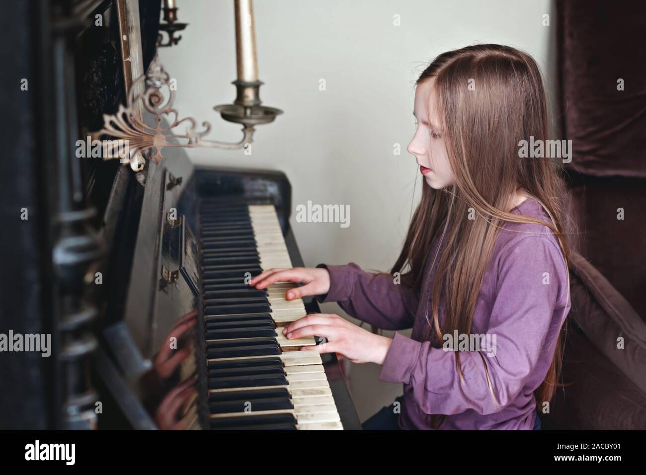 Vintage piano child hi-res stock photography and images - Alamy