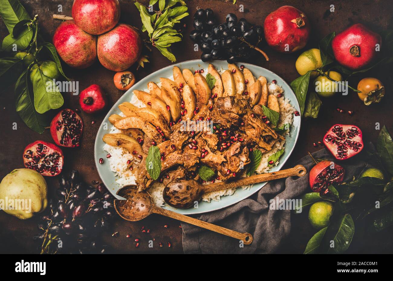 Turkish meat dish with roasted lamb chops, quince, rice pilav Stock ...