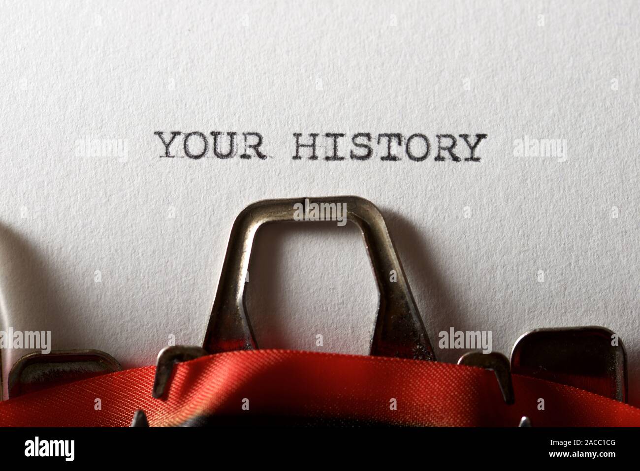 The sentence, Your History, written with a typewriter Stock Photo - Alamy