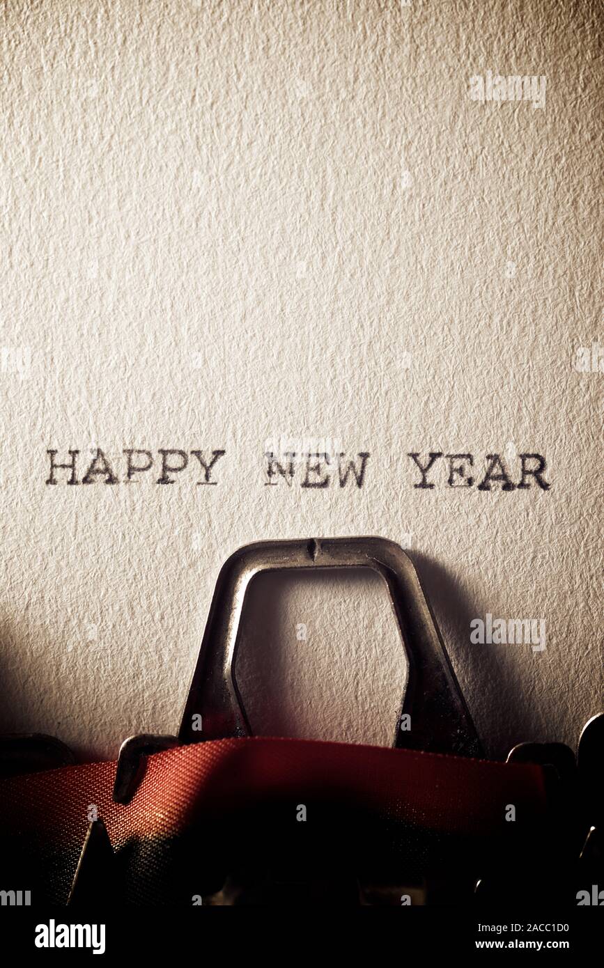 The sentence, Happy New Year, written with a typewriter Stock Photo - Alamy