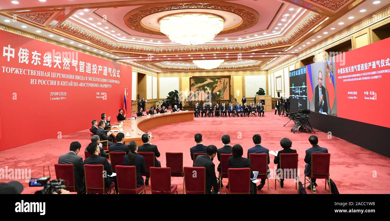 Beijing, China. 2nd Dec, 2019. Chinese President Xi Jinping has a video ...